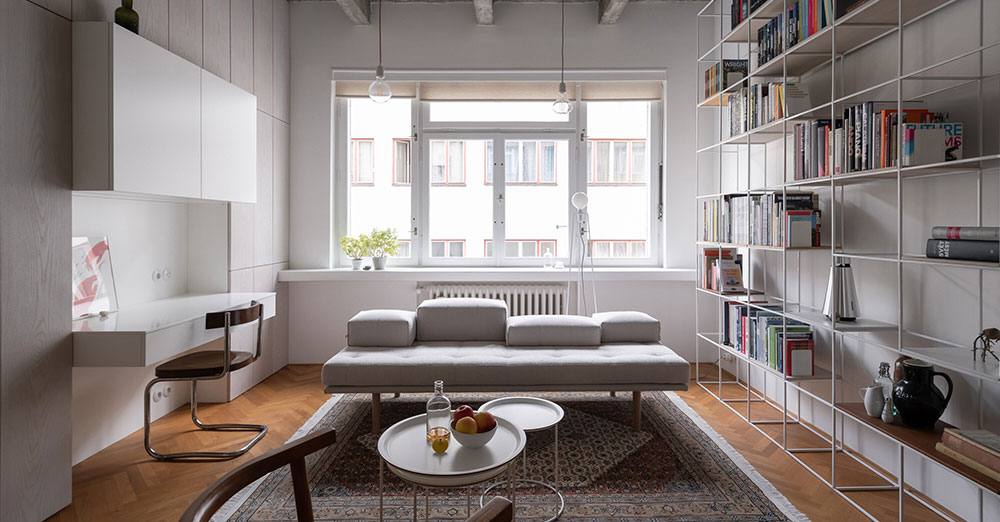 Functionalist Apartment with Pink Piggy by Martin Cenek Architecture